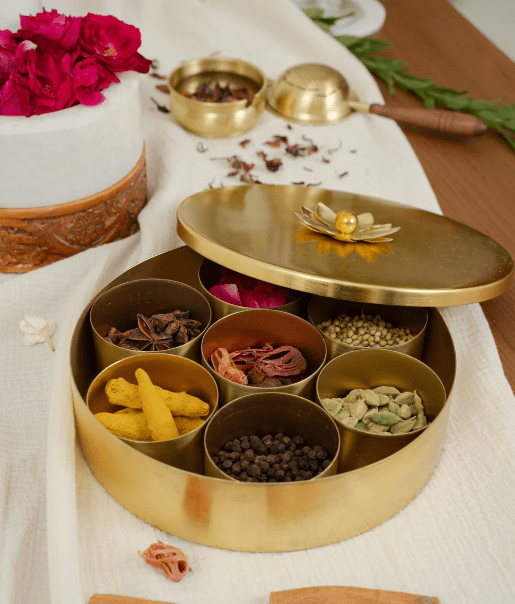 e Up Your Life with a Marble Lotus Brass Masala Dabba